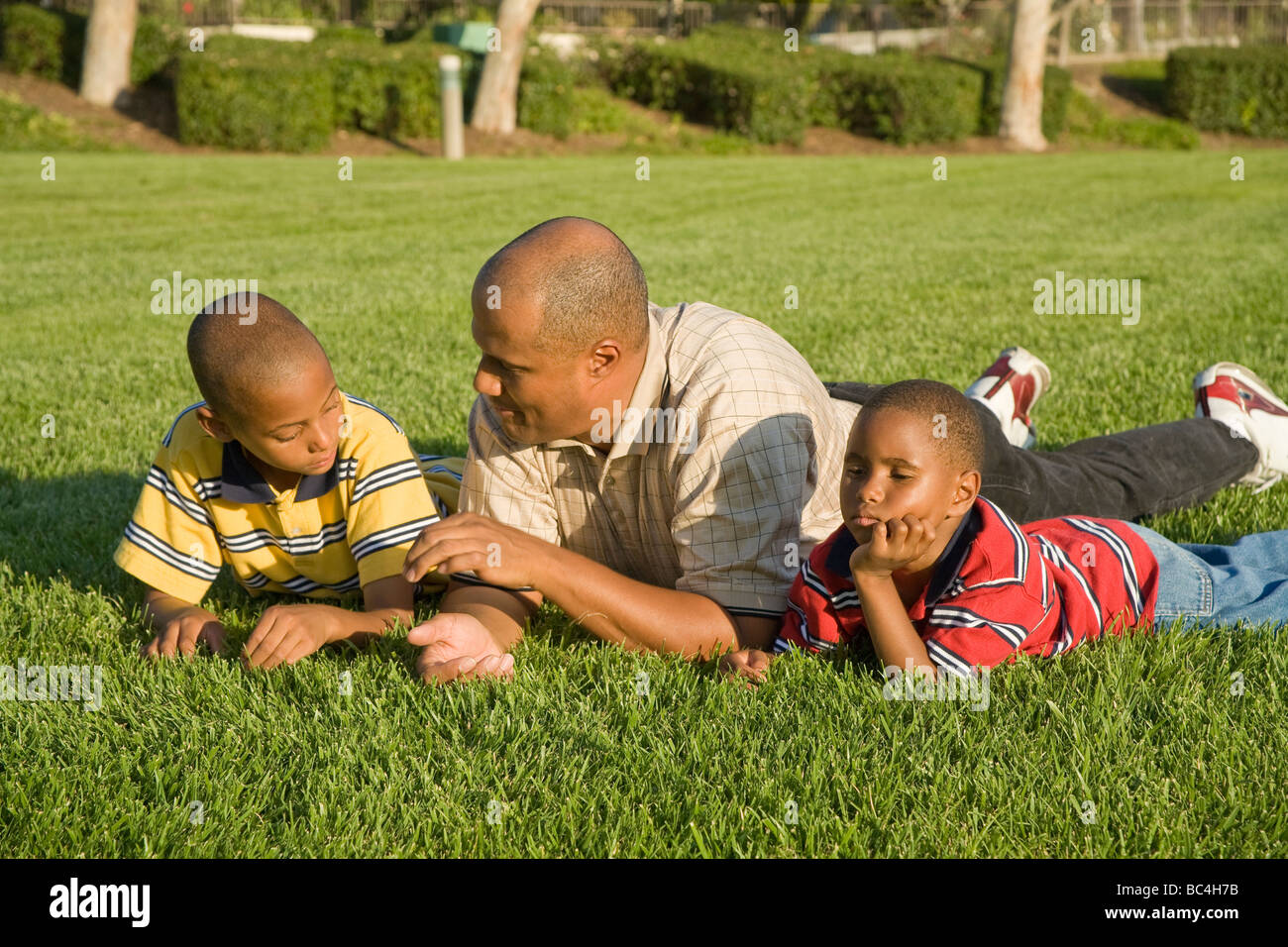 Black father son conversation hi-res stock photography and images - Alamy