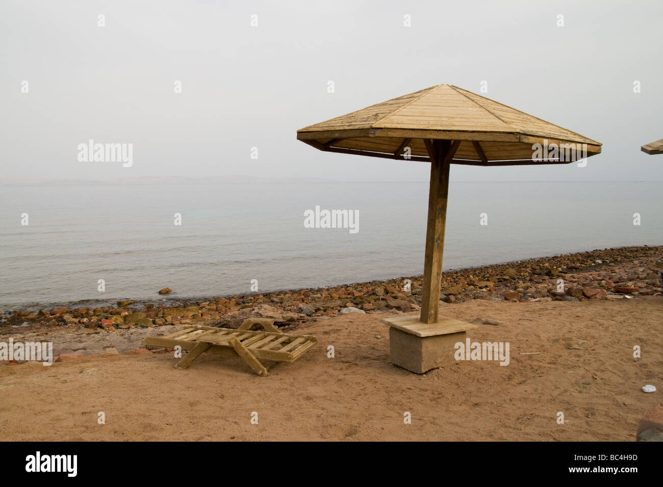 Beach umbrella and deck chair in Dahab, Red Sea, Republick of Egypt ...