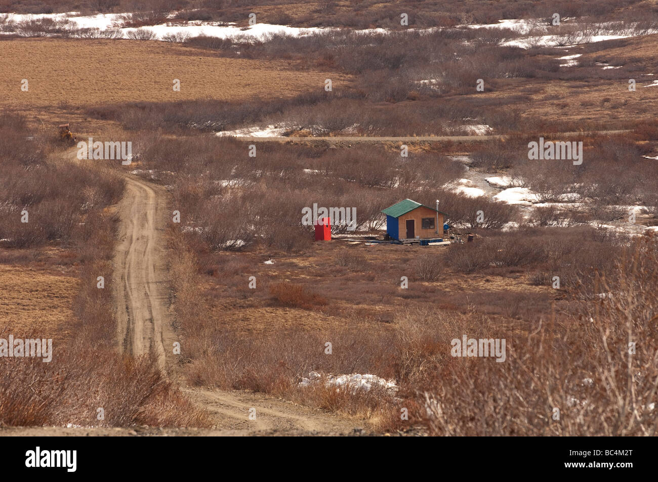 A CABIN WITH A RED OUTHOUSE ON THE ALASKAN TUNDRA Stock Photo - Alamy