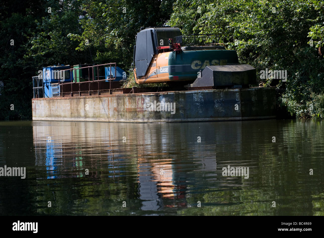 old disused river mud silt dredger reflection rust river medway yalding ...