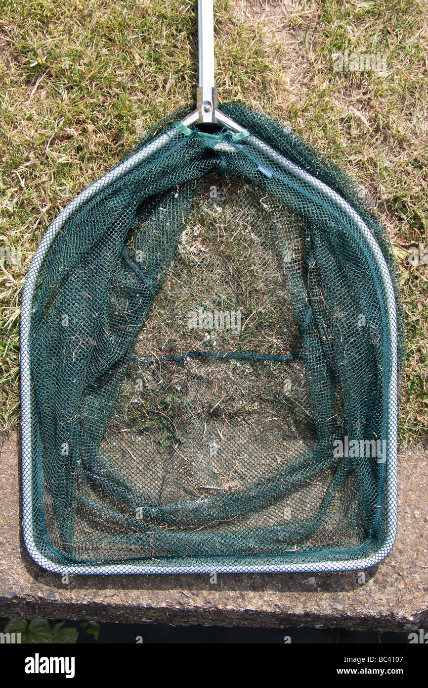resting fishing angling fisherman grass verge green fishing angling net ...