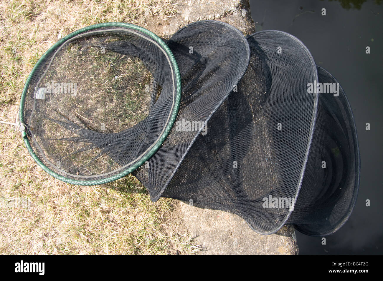 resting fishing angling fisherman grass verge green fishing angling net ...