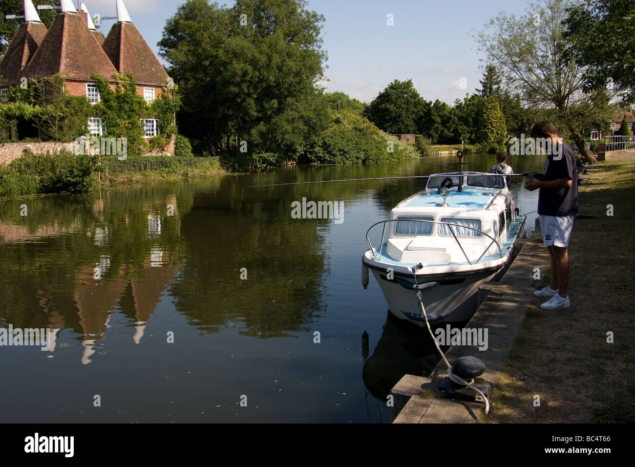 fishing leisure pleasure boat craft cruiser river Yalding river Medway ...