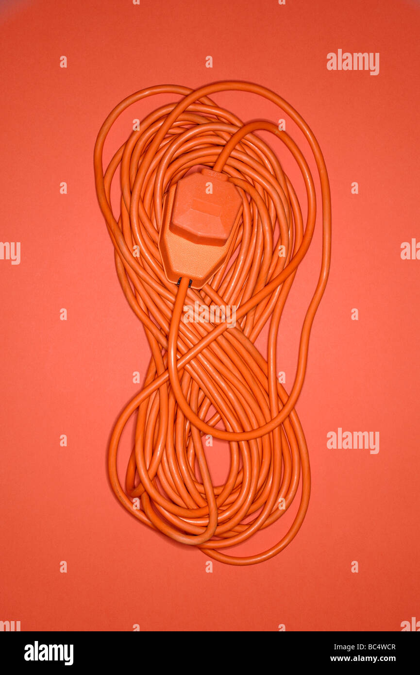 Coiled orange electrical cable Stock Photo - Alamy