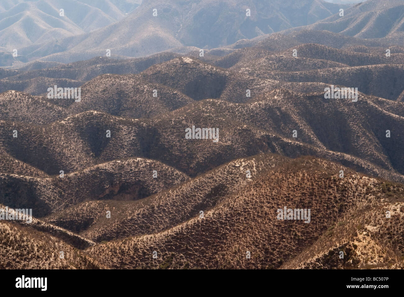 Hazy rugged mountains and landscapes in the Sierra Gorda range in the ...