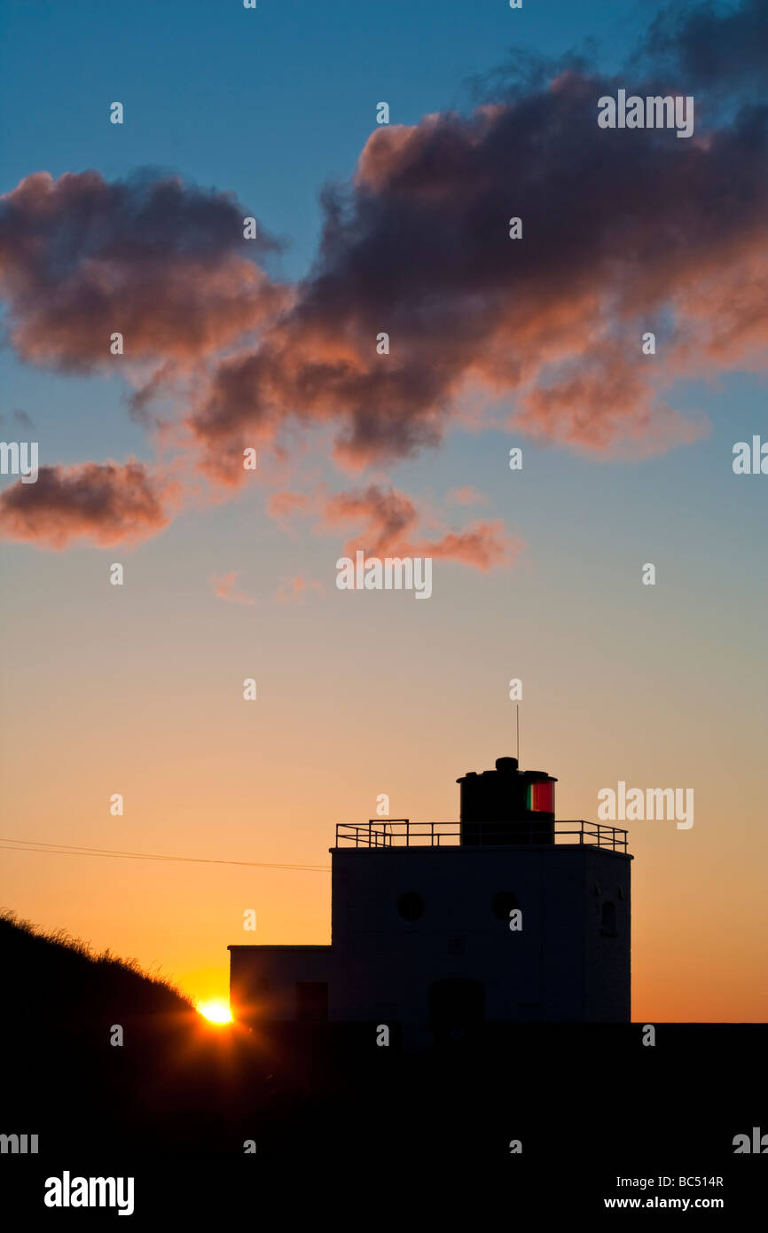 Bamburgh Lighthouse on Blackrocks Point near the vilage of Bamburgh on ...
