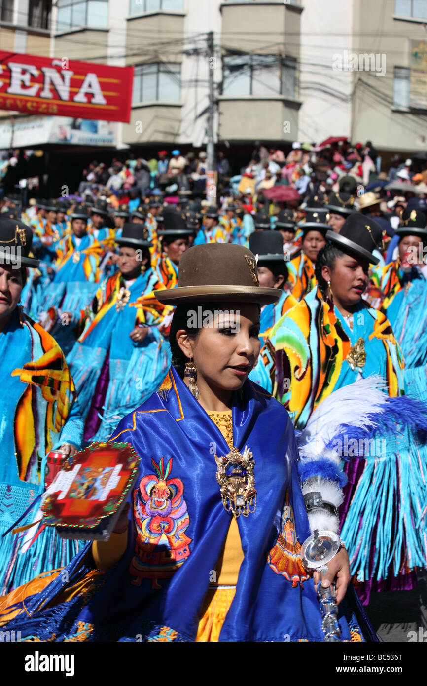 Cholitas wearing traditional dress dancing the morenada at the Gran Poder festival, La Paz ...