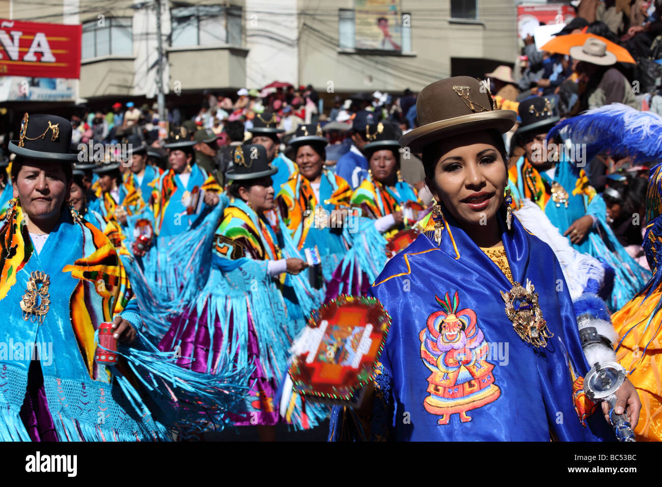 Cholitas wearing traditional dress dancing the morenada at the Gran Poder festival, La Paz ...