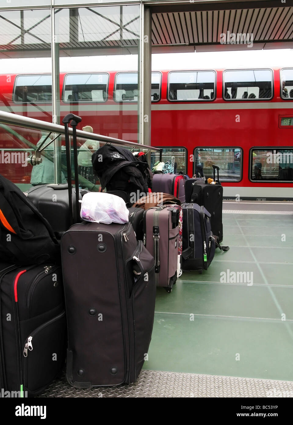 Travel Bags and Luggage on the Platform of a German Railway Station ...