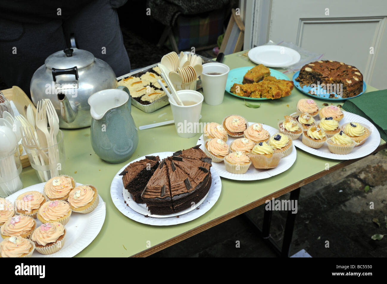 Tea and cakes on table Stock Photo - Alamy
