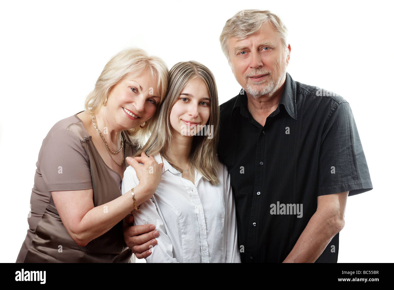 Portrait of three members of family Stock Photo - Alamy