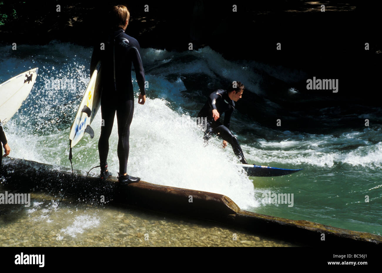 Young man at river isar hi-res stock photography and images - Alamy