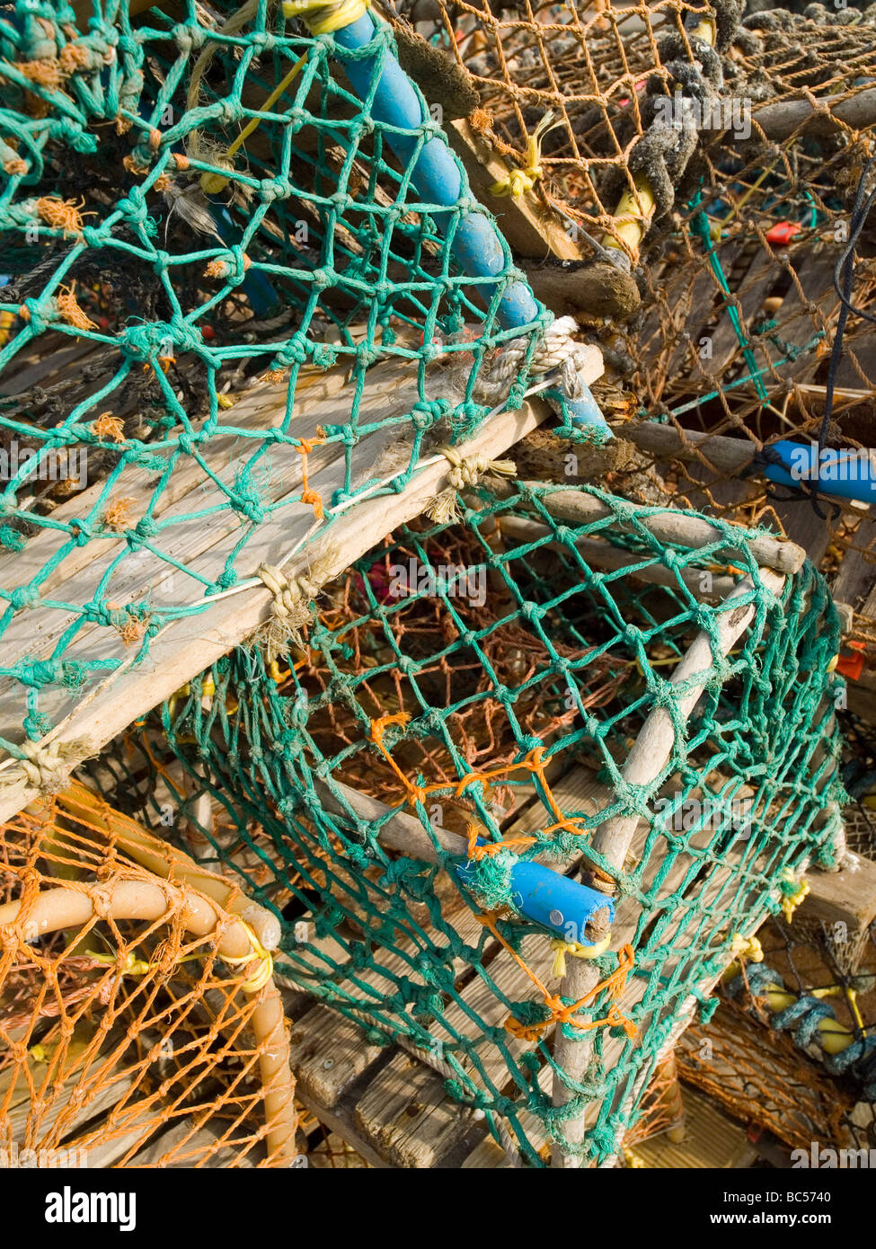 Fishing crates in the harbour of St Abbs, a pretty fishing village on ...