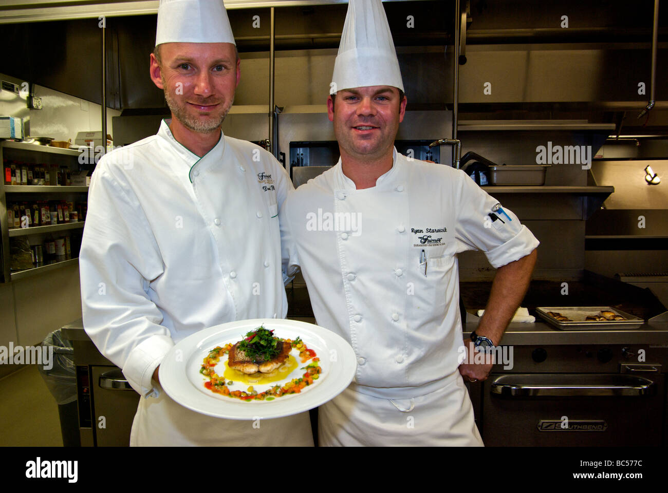 Executive and sous chefs with boneless fillet seared snapper sauteed ...