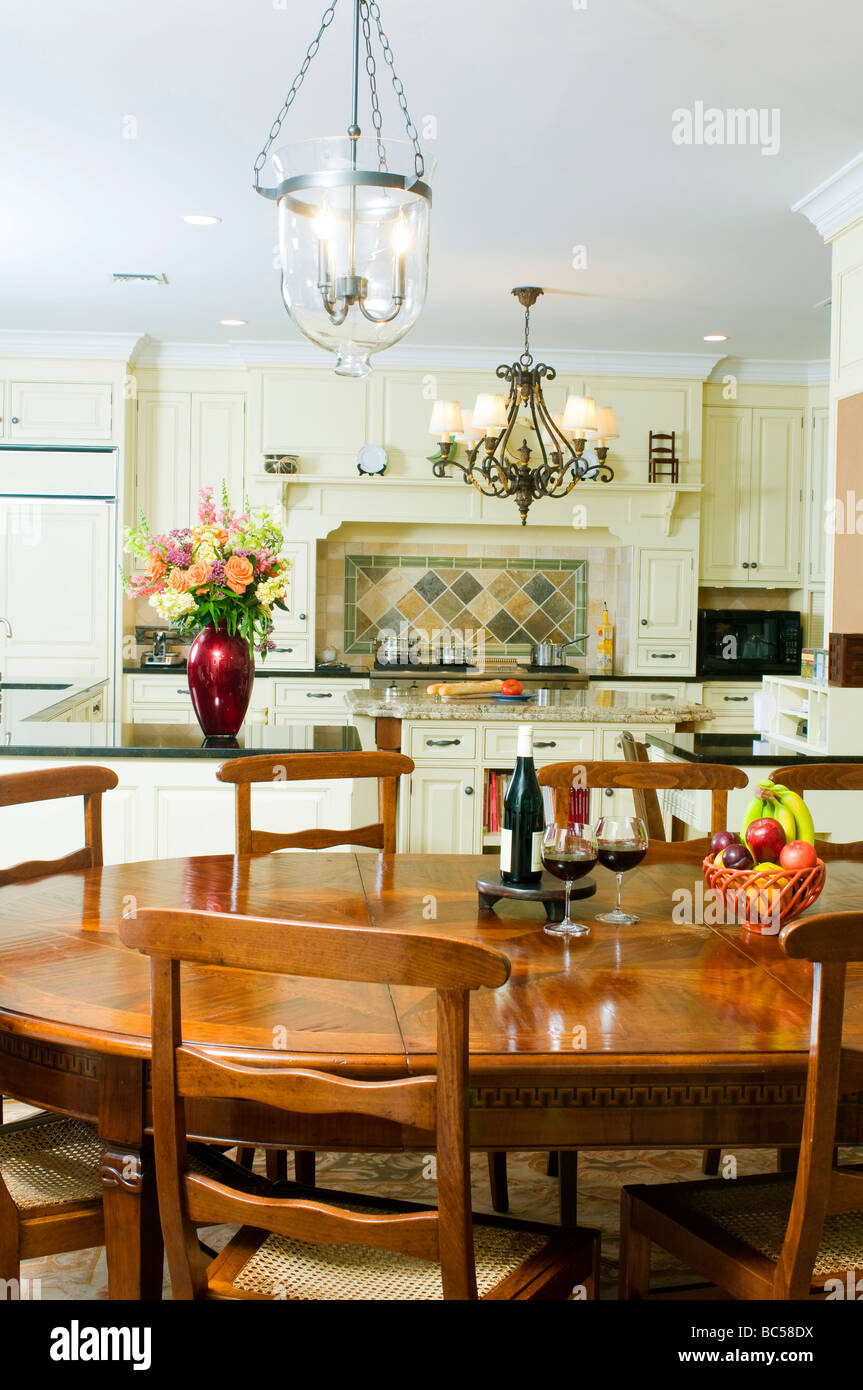 luxury home kitchen with dining table with wine and fruit Stock Photo ...