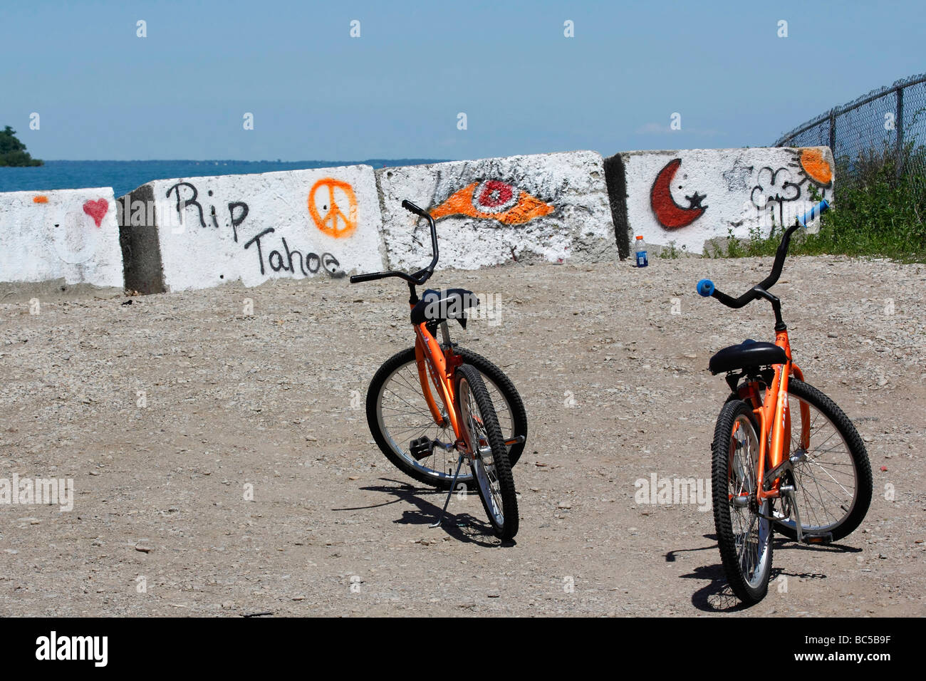 Bike camping travel Parked two bikes on beach nobody none no one Lake ...