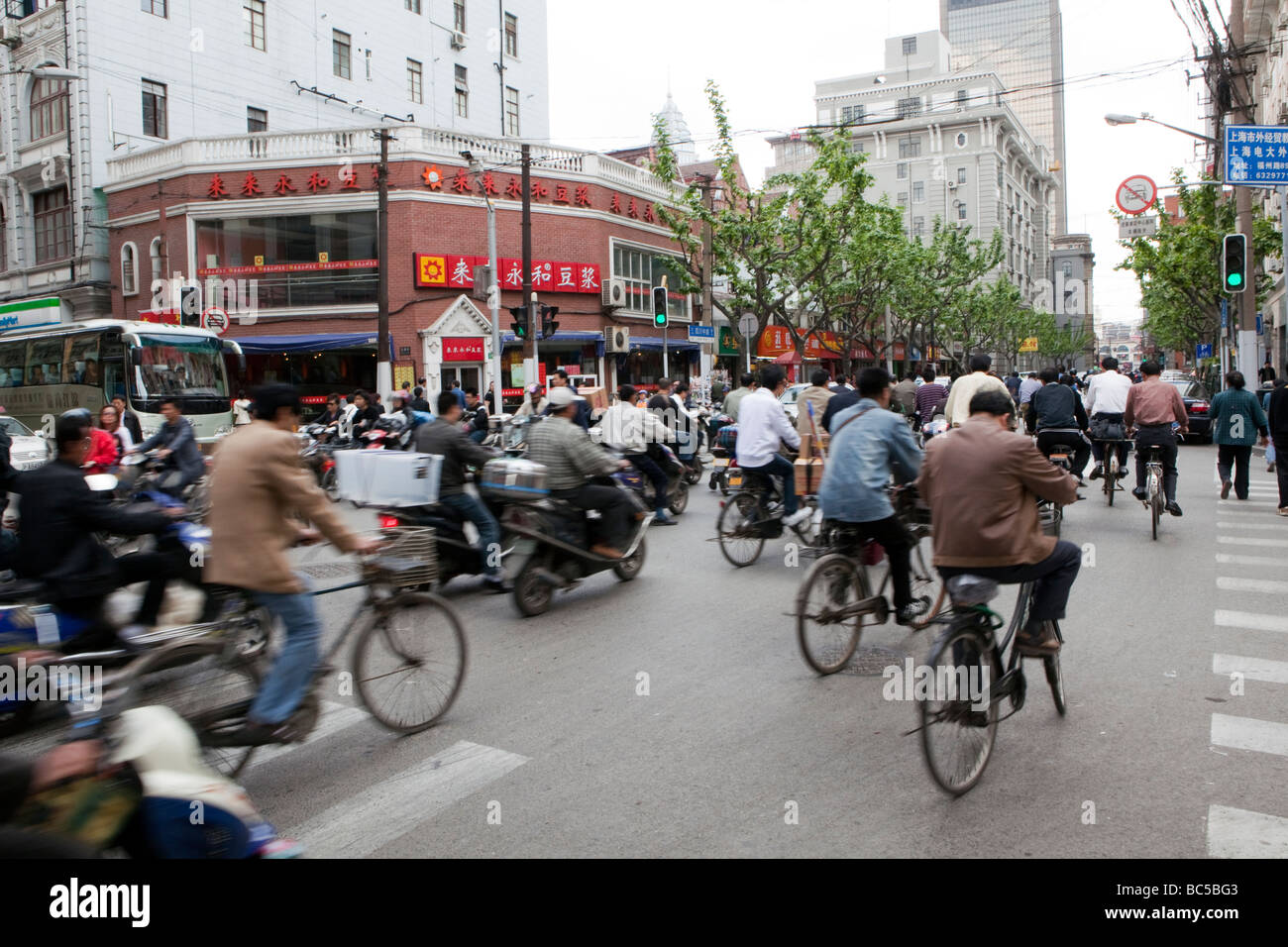 People are seen riding on bikes in Shanghai, China Stock Photo - Alamy