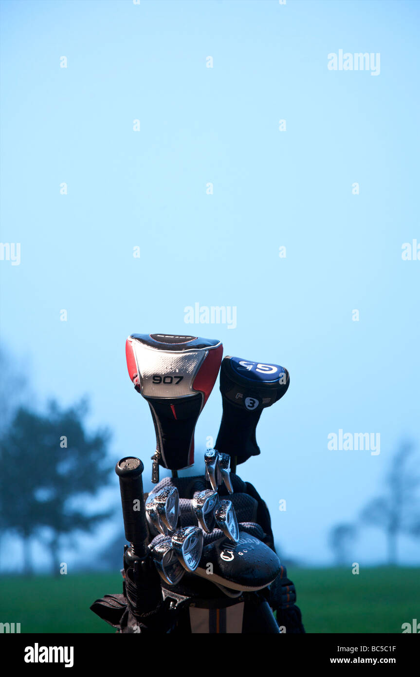 Golf bag in bad weather Stock Photo - Alamy
