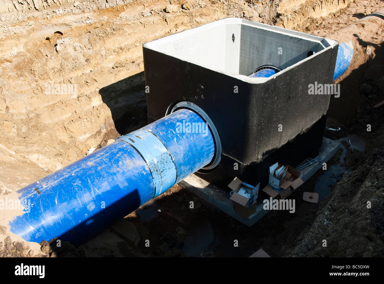 Water pipe being laid at the Louis Clark Regional Water System pipeline ...