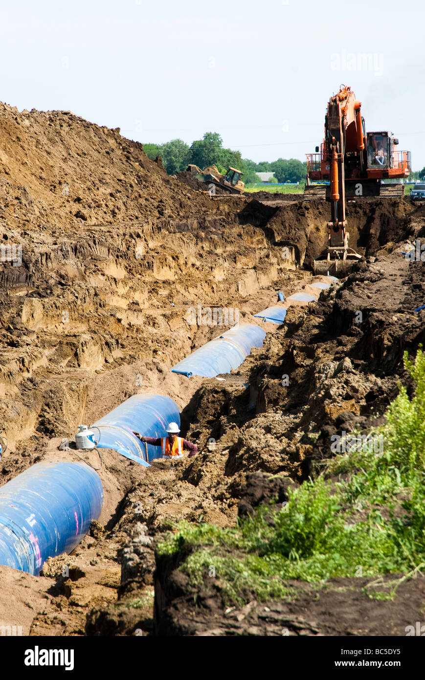 Water pipe being laid at the Louis and Clark Regional Water System ...