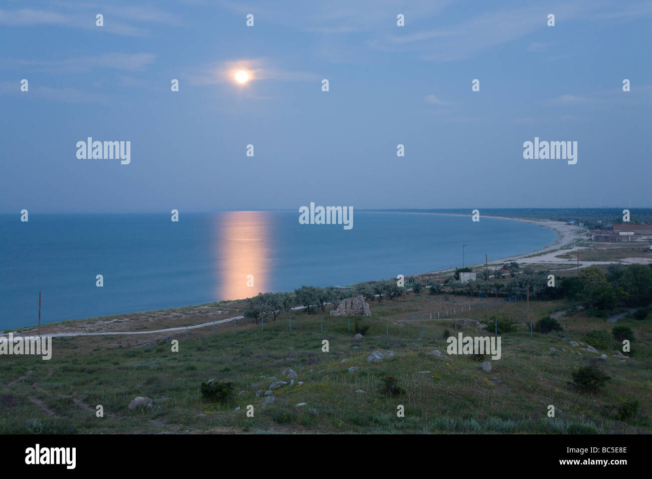 Moonlight path on night sea water surface Stock Photo - Alamy