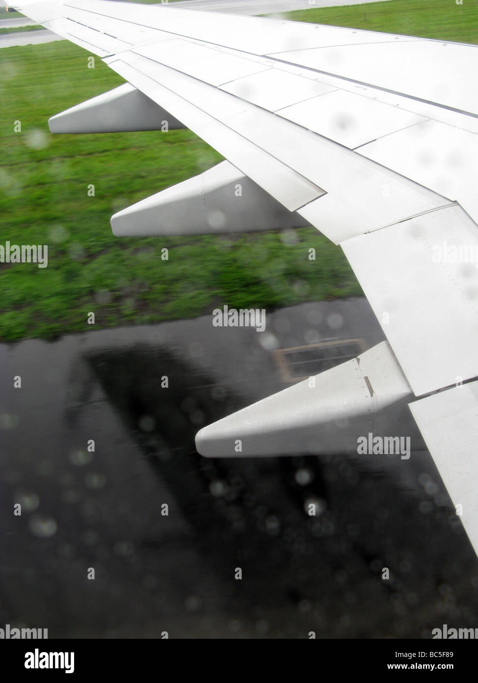 Airplane taking off in bad weather hi-res stock photography and images ...
