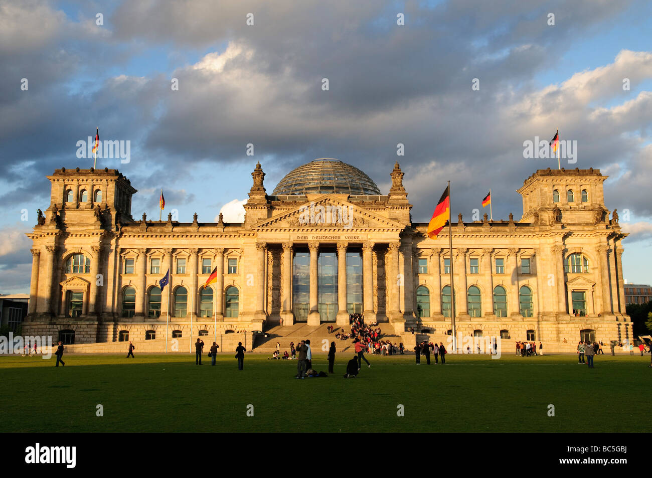 BERLIN, Germany — The historic Reichstag building gleams in the late ...