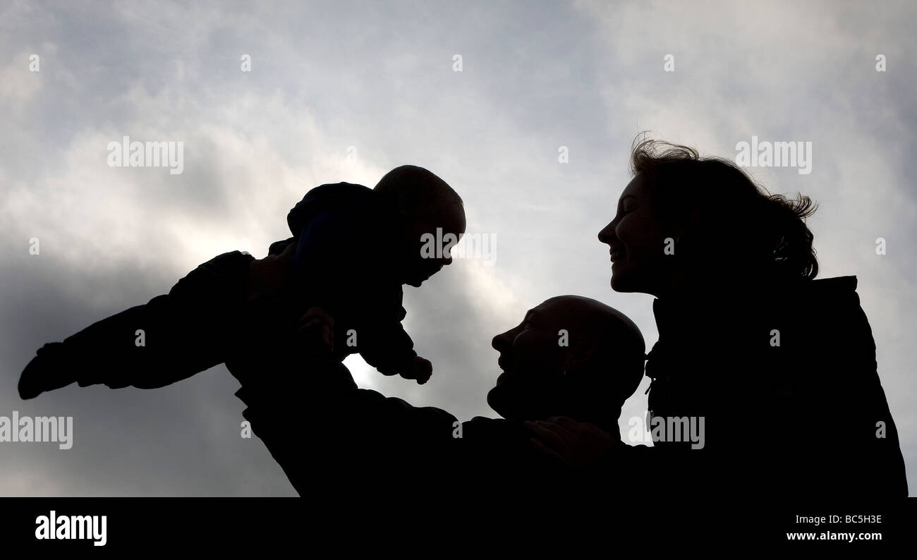 Man lifting child silhouette hi-res stock photography and images - Alamy