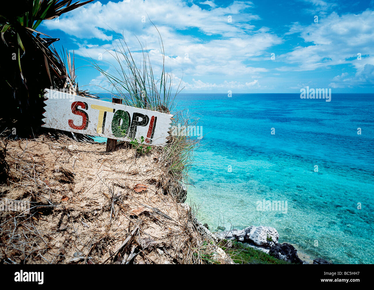 Bahamas, Stop sign on beach Stock Photo - Alamy