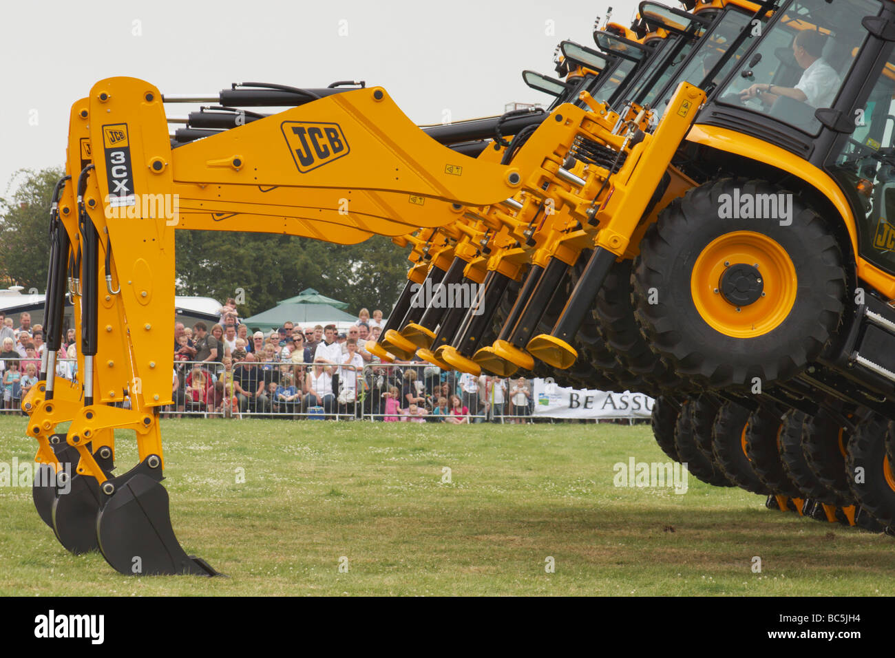 JCB 'dancing diggers' acrobatic display at the Derbyshire County Show ...