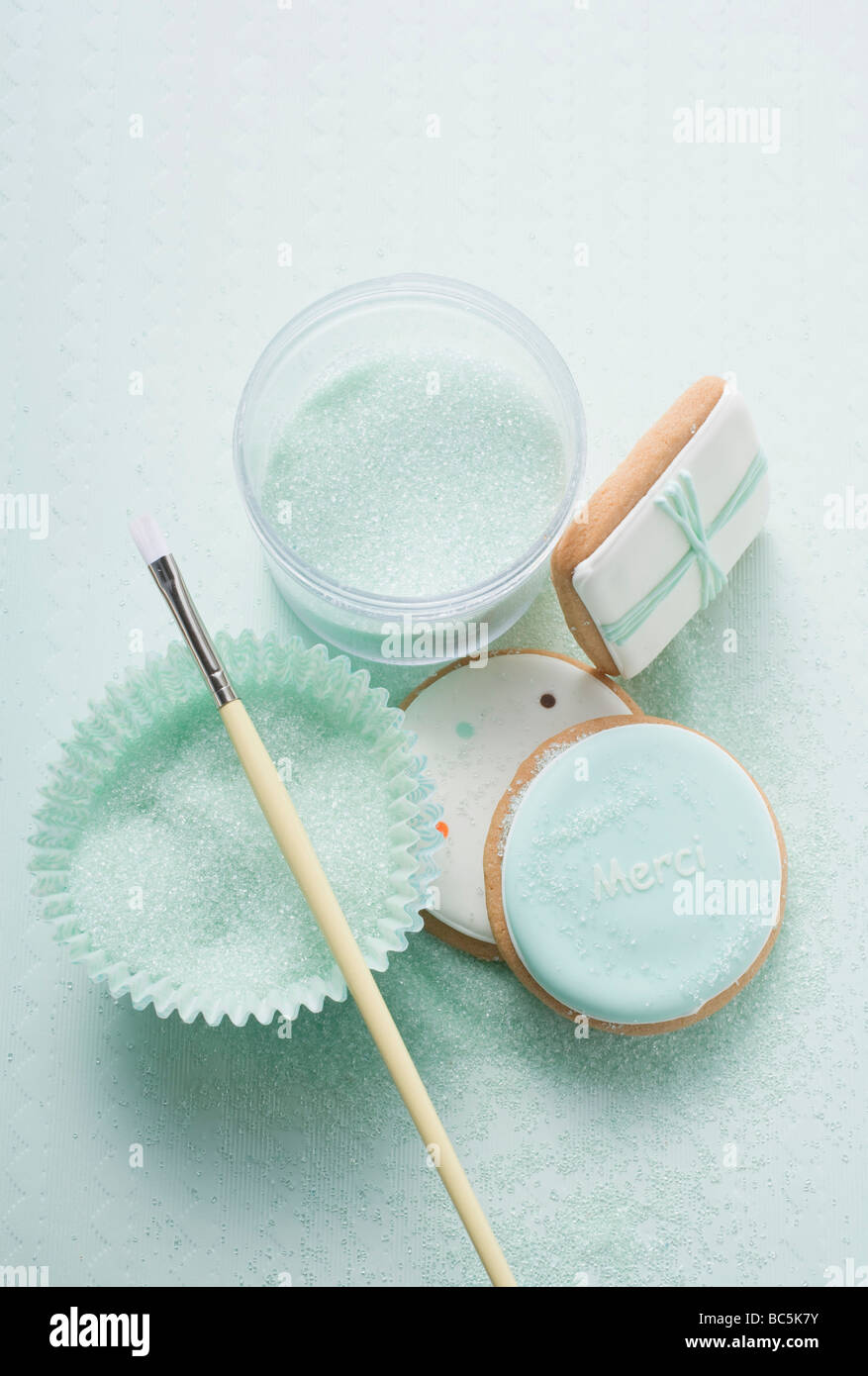 Pastel-coloured biscuits with coloured sugar Stock Photo - Alamy