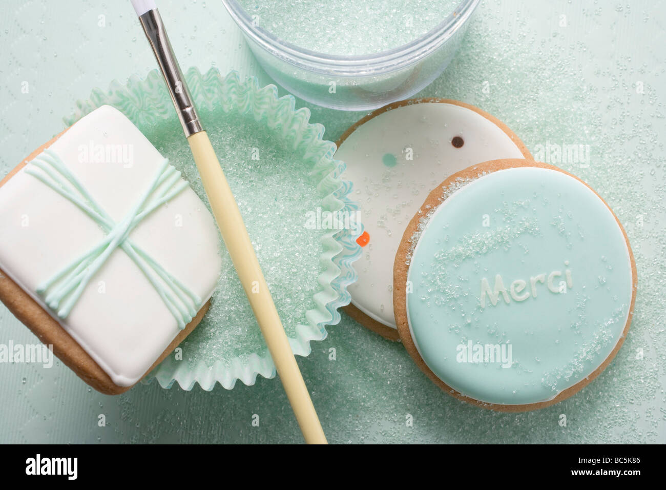 Pastel-coloured biscuits with coloured sugar (close-up Stock Photo - Alamy