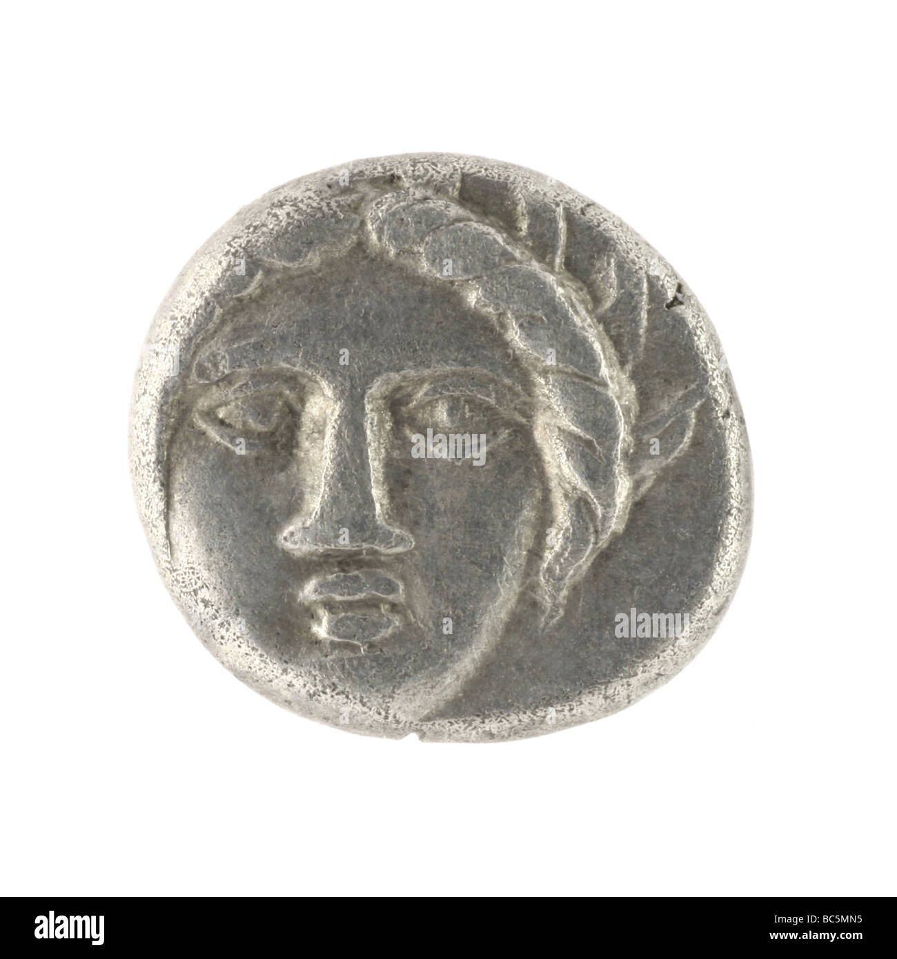 Apollo on ancient Greek half drachm from 400 BC Stock Photo - Alamy
