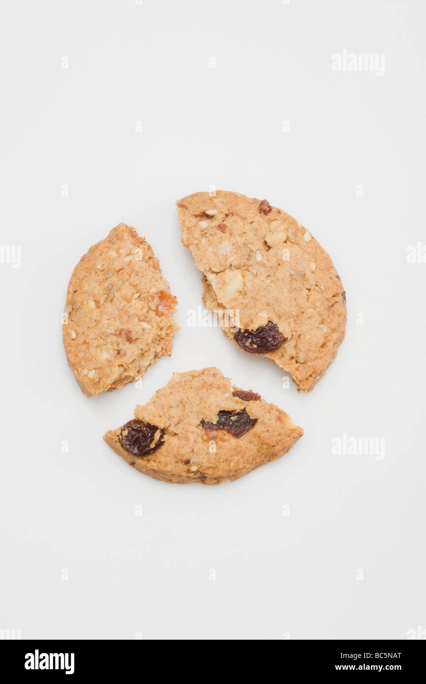 A wholemeal biscuit, broken Stock Photo - Alamy