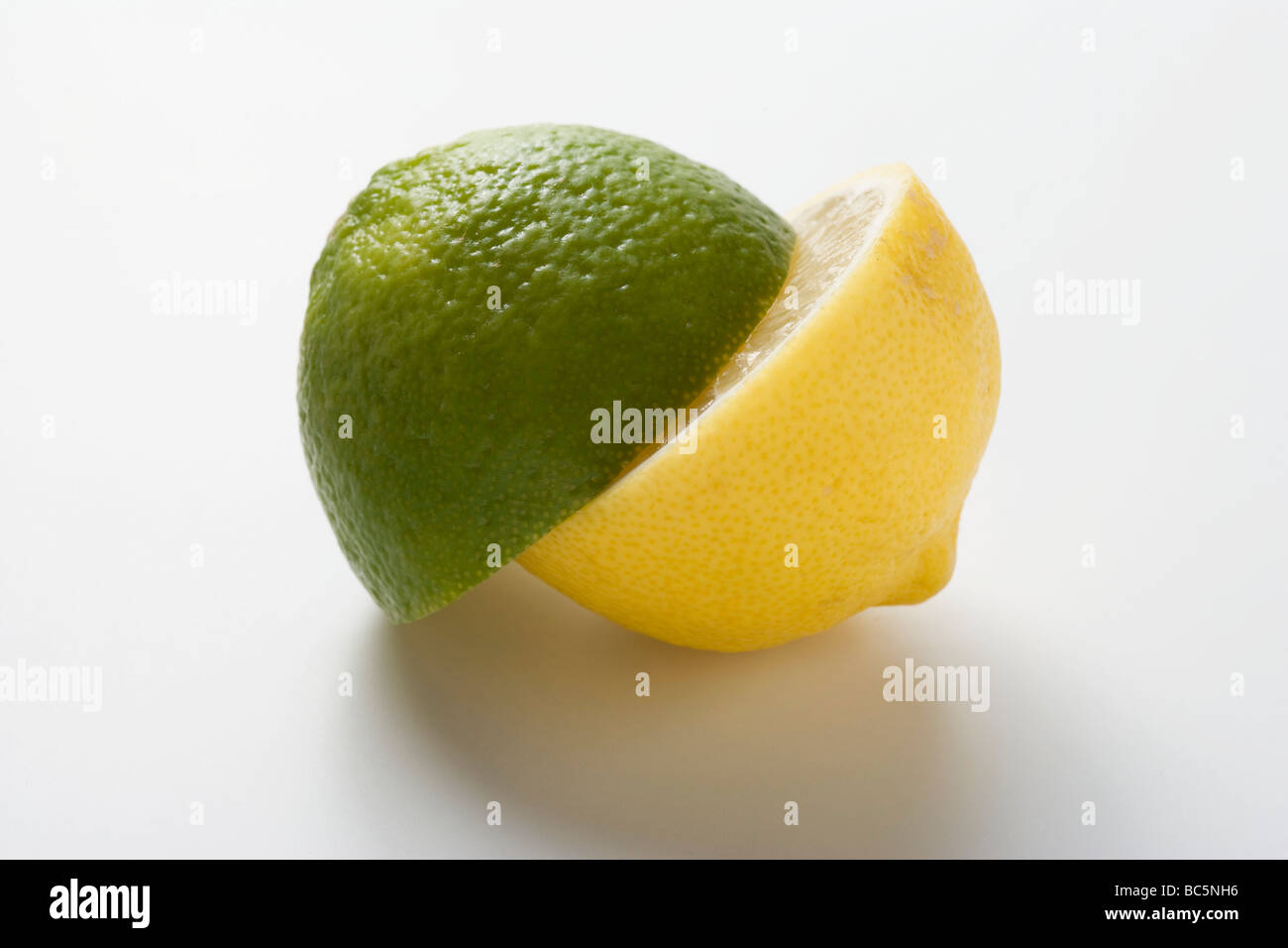 Half a lime and half a lemon Stock Photo - Alamy