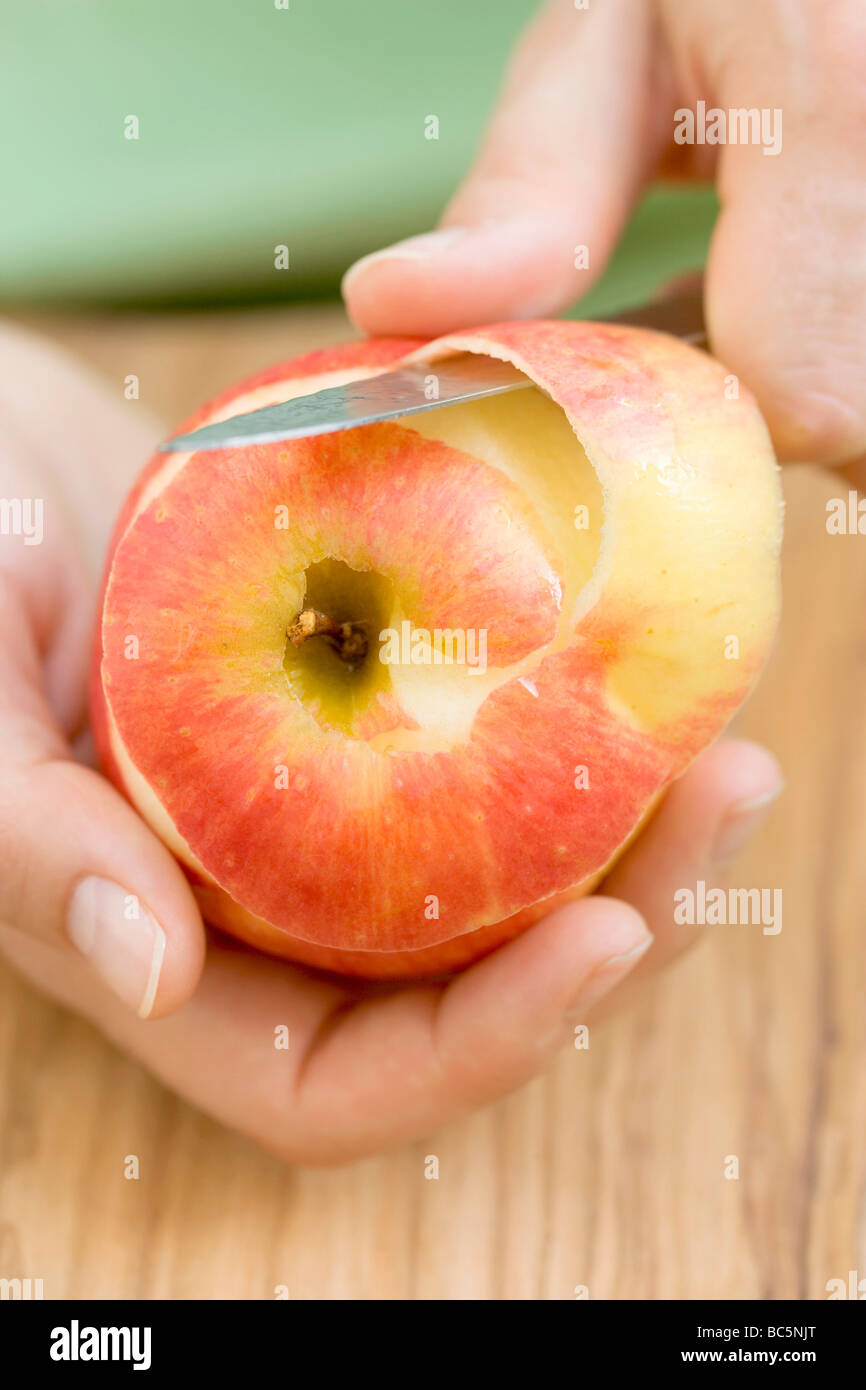 Peeling an apple Stock Photo - Alamy