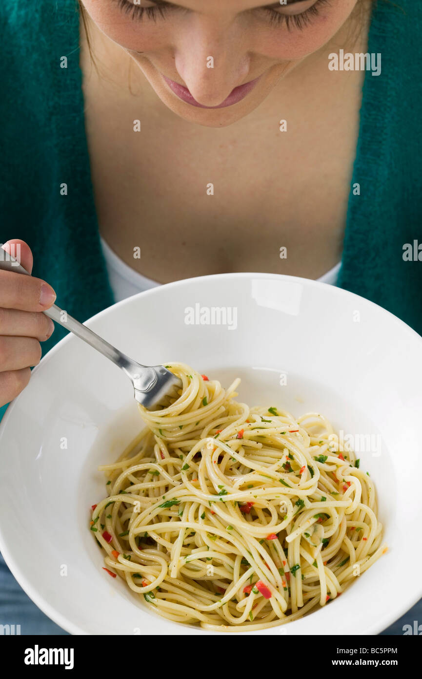Olive oil pasta eating woman hi-res stock photography and images - Alamy