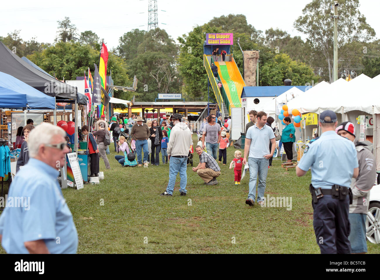 Crowds touring events and displays at local agricultural show Stock ...