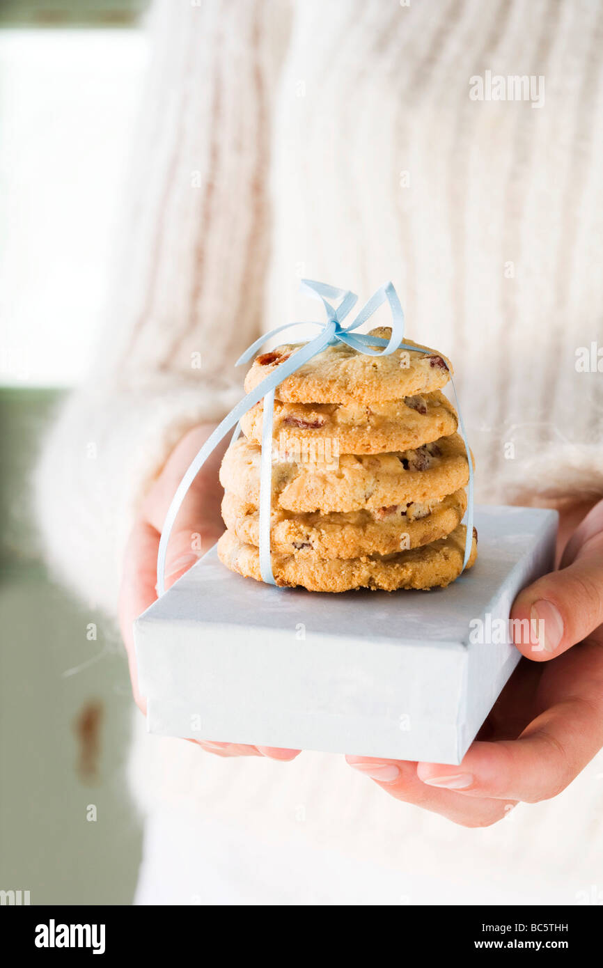 Hands hold cookies in hi-res stock photography and images - Alamy