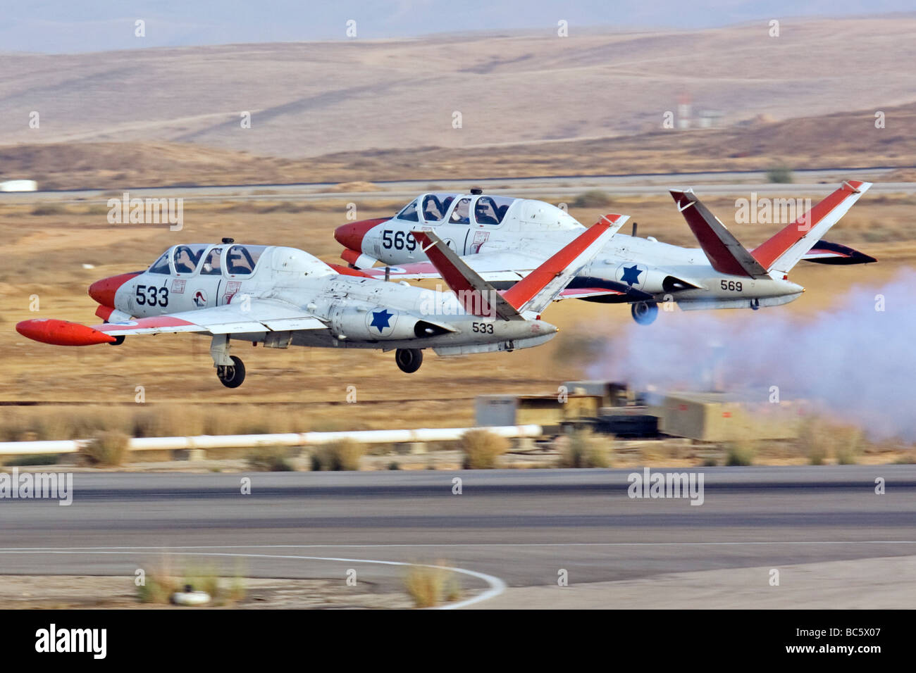 2 Israeli Air force Fouga Magister CM 170 aerobatics display at takeoff ...