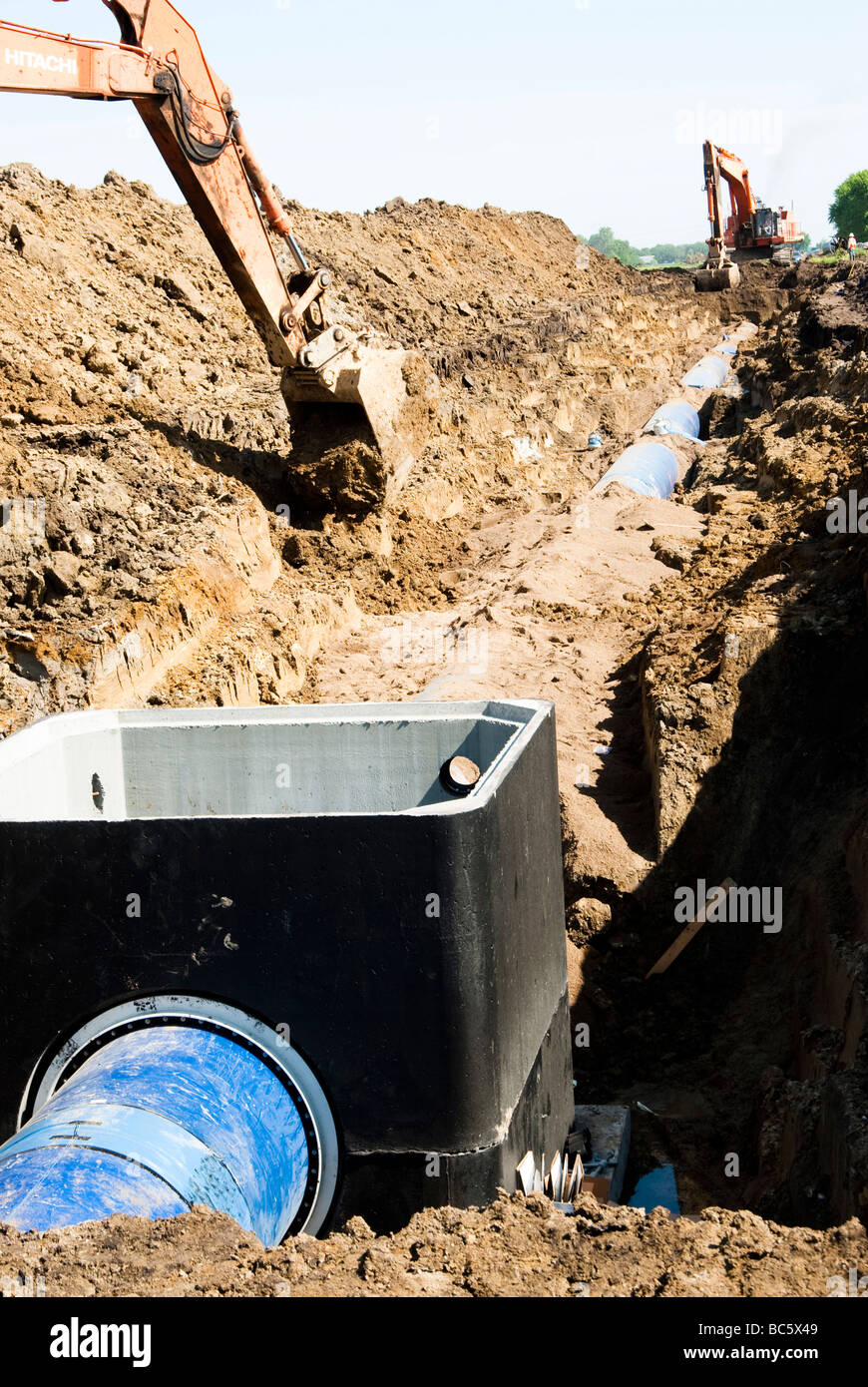 Water pipe being laid at the Louis Clark Regional Water System pipeline ...