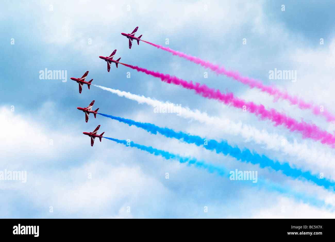 Five Red Arrows Hawk aircraft trailing smoke in formation Stock Photo ...