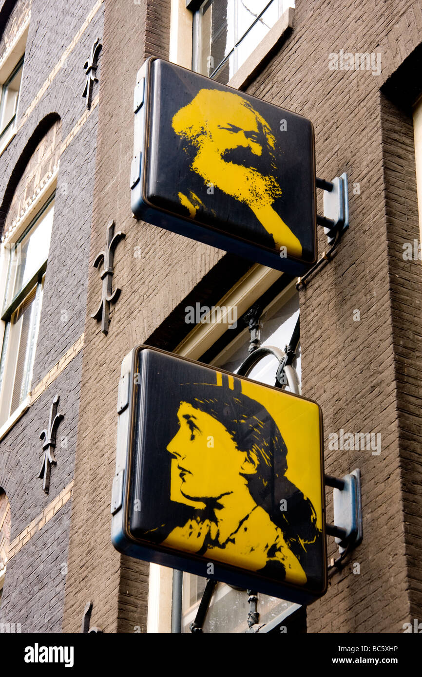 Signs of an Amsterdam bookshop with portraits of Karl Marx and Virginia ...