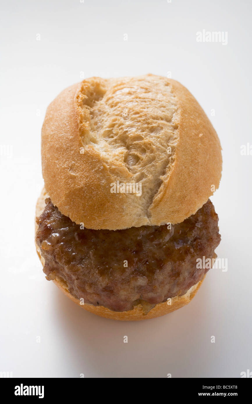 Burger in a bread roll Stock Photo - Alamy