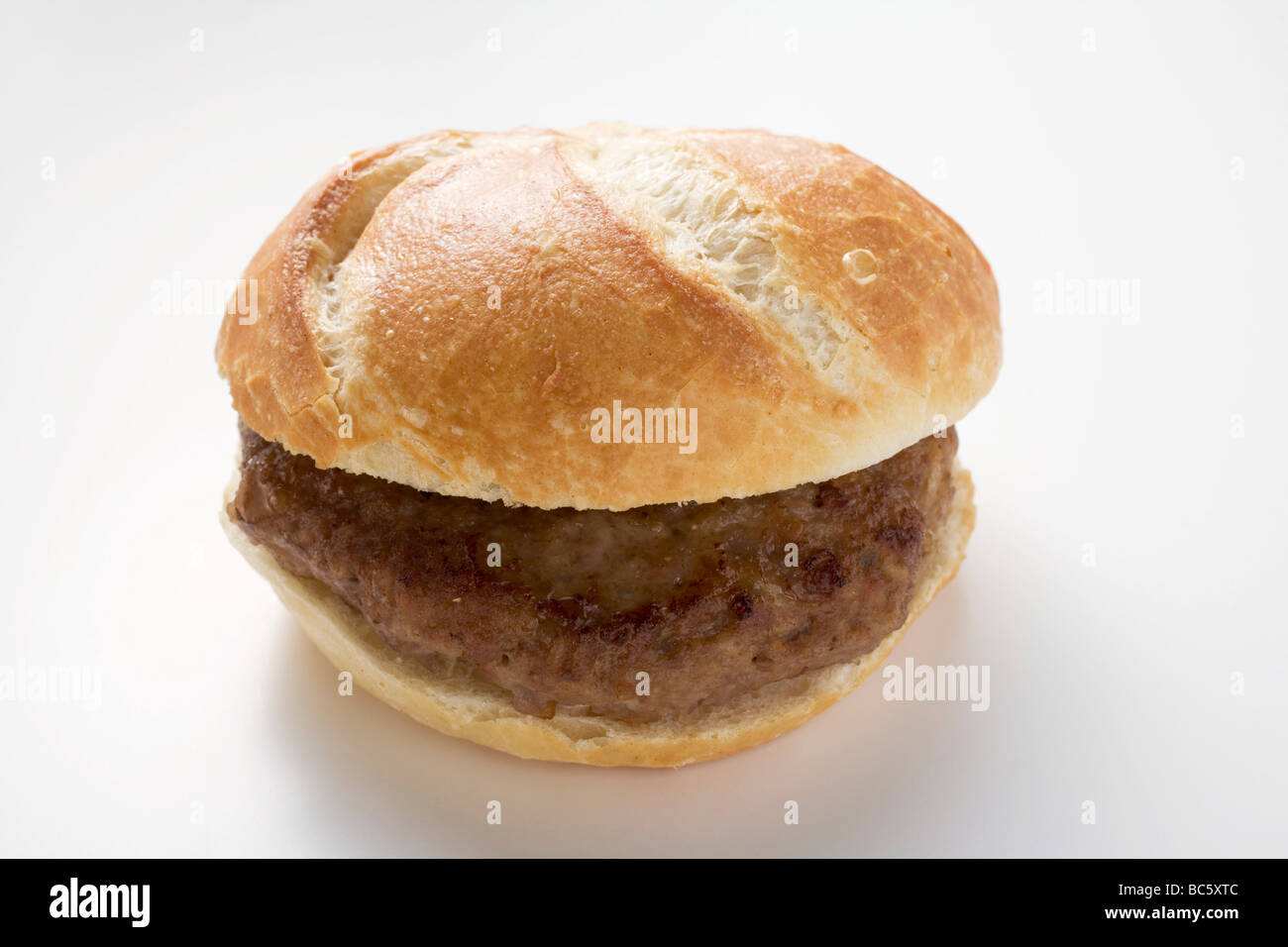 Burger in a bread roll Stock Photo - Alamy