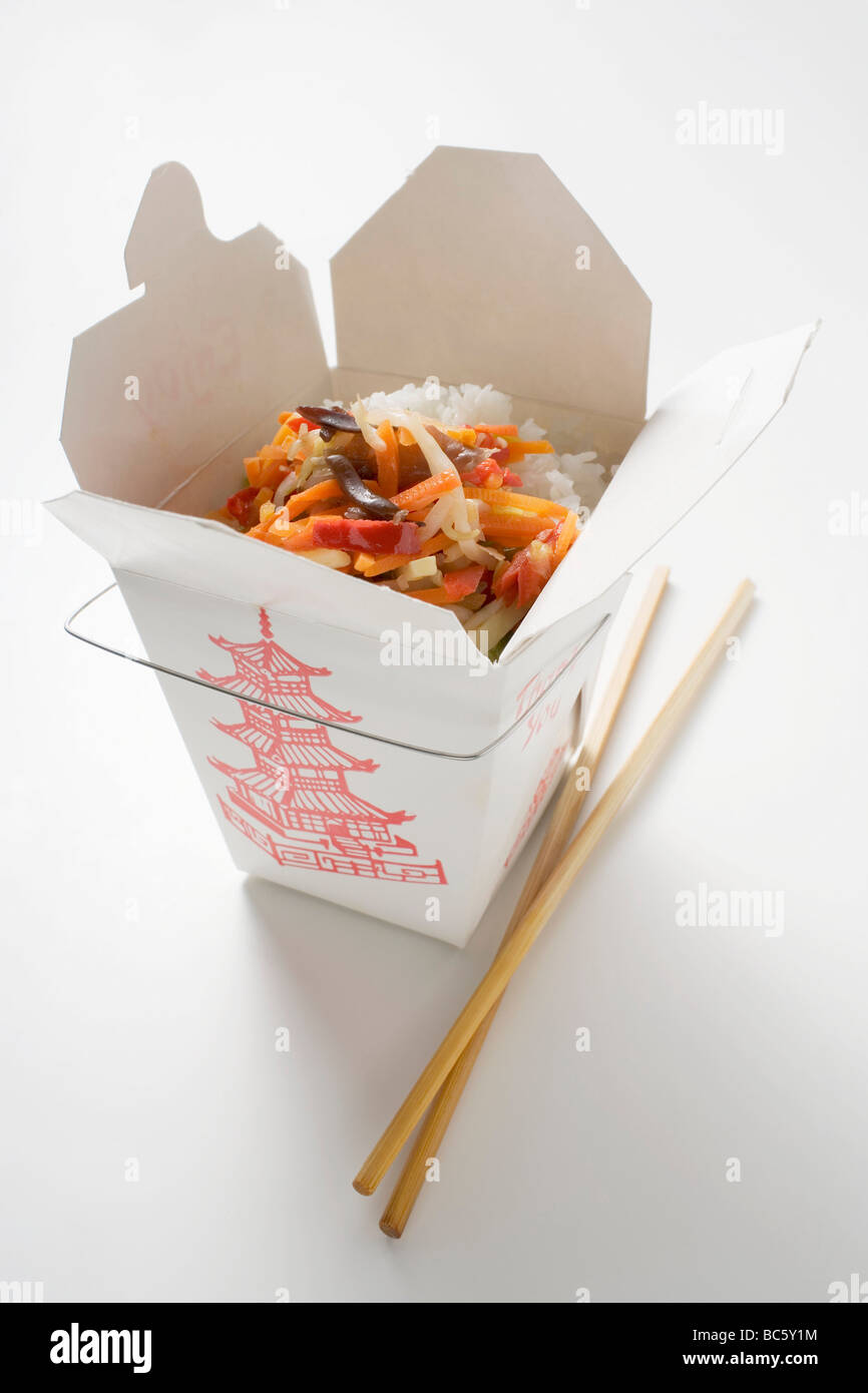 Rice with Asian vegetables to take away Stock Photo - Alamy