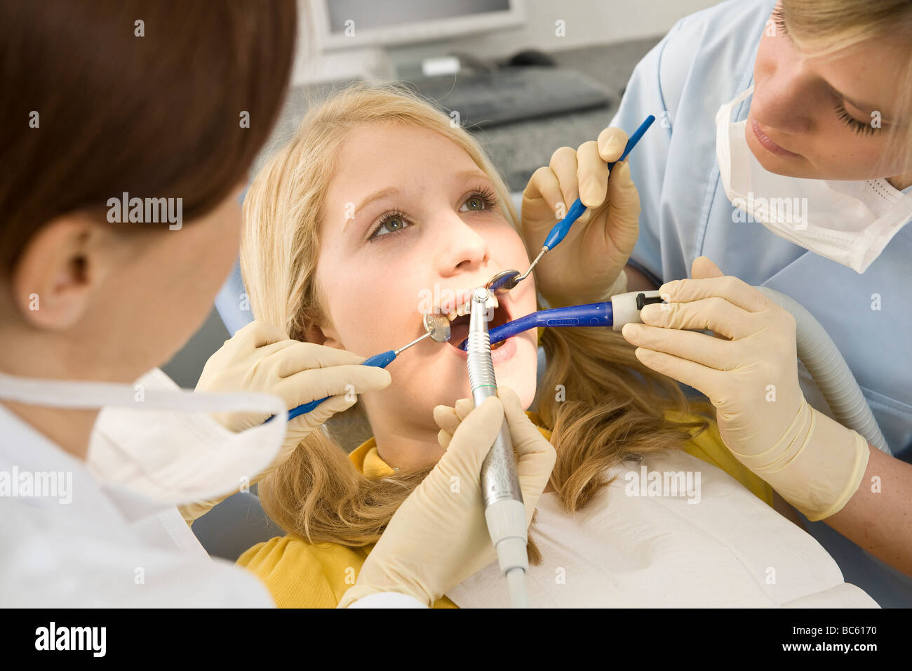 Girl at dentist Stock Photo - Alamy