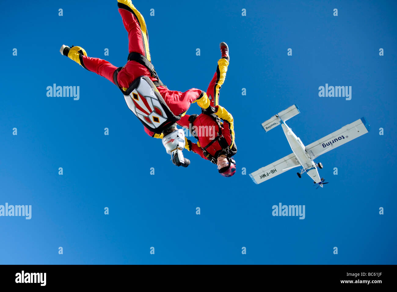 Two Parachutists doing free fall, Switzerland Stock Photo - Alamy