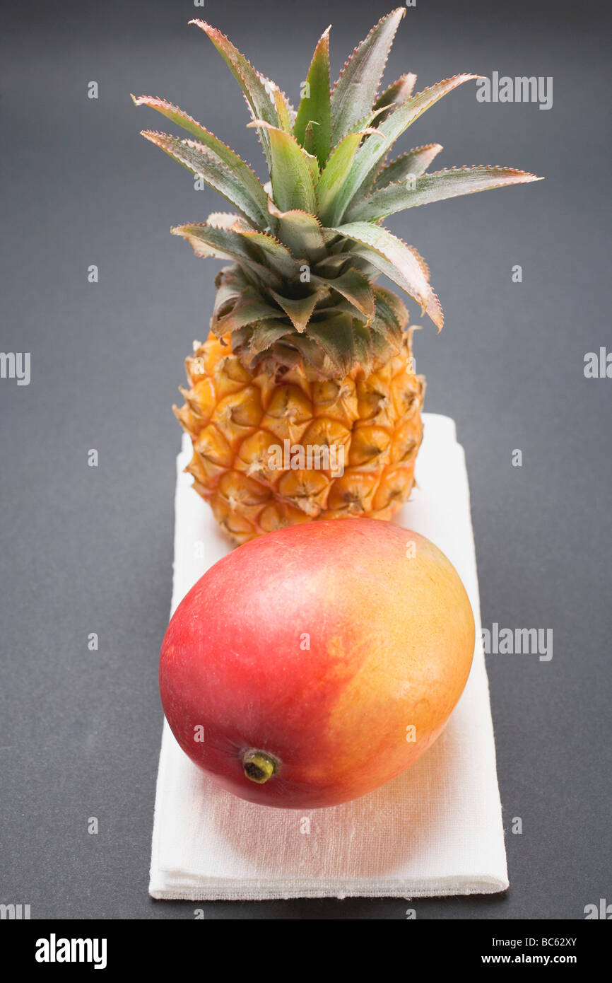 Pineapple and mango Stock Photo - Alamy