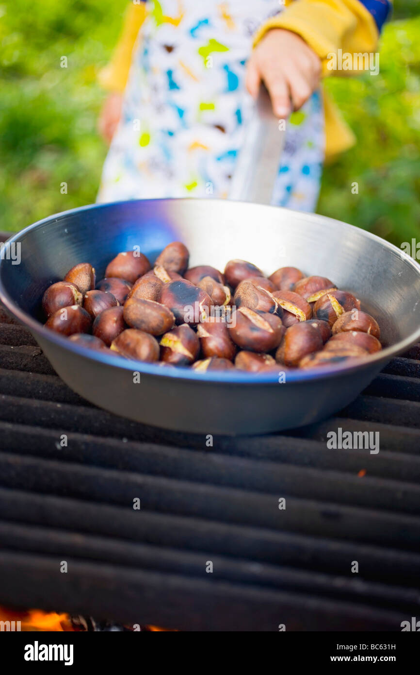 Roasting chestnuts Stock Photo - Alamy